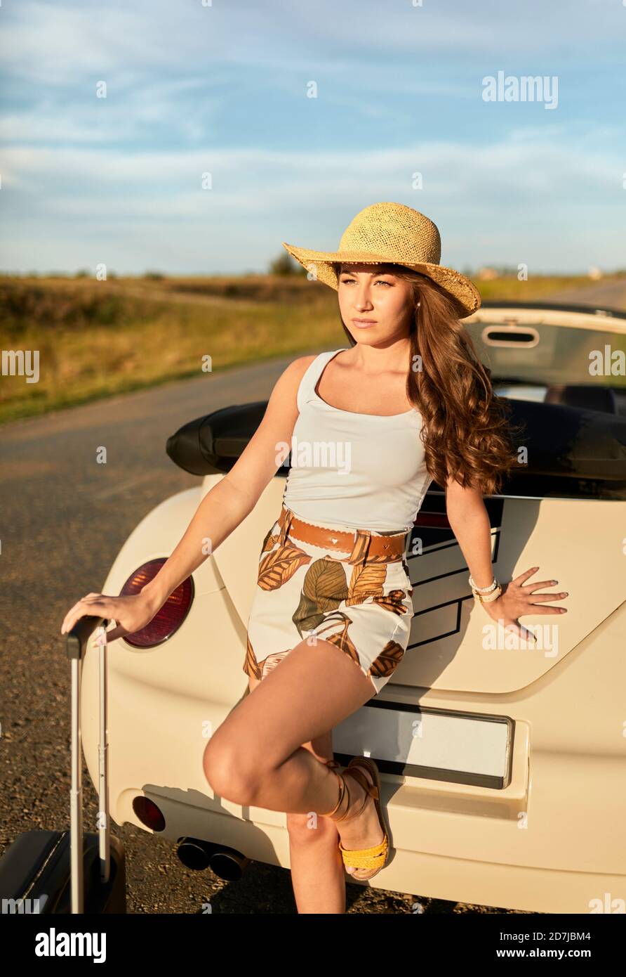 Leaning against convertible car hi-res stock photography and images - Alamy