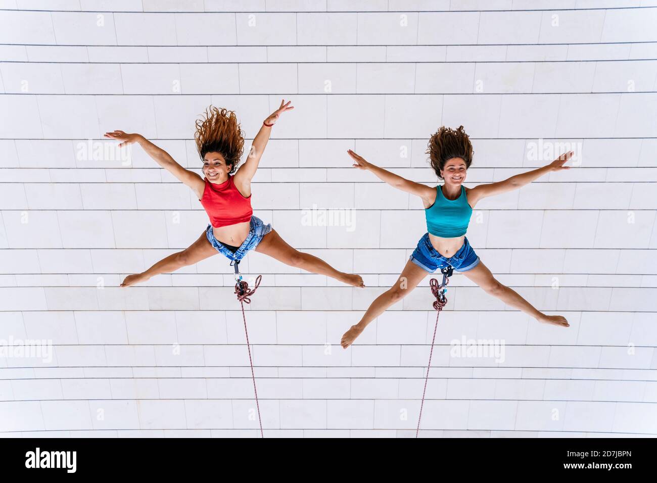 Hanging by arms hi-res stock photography and images - Alamy