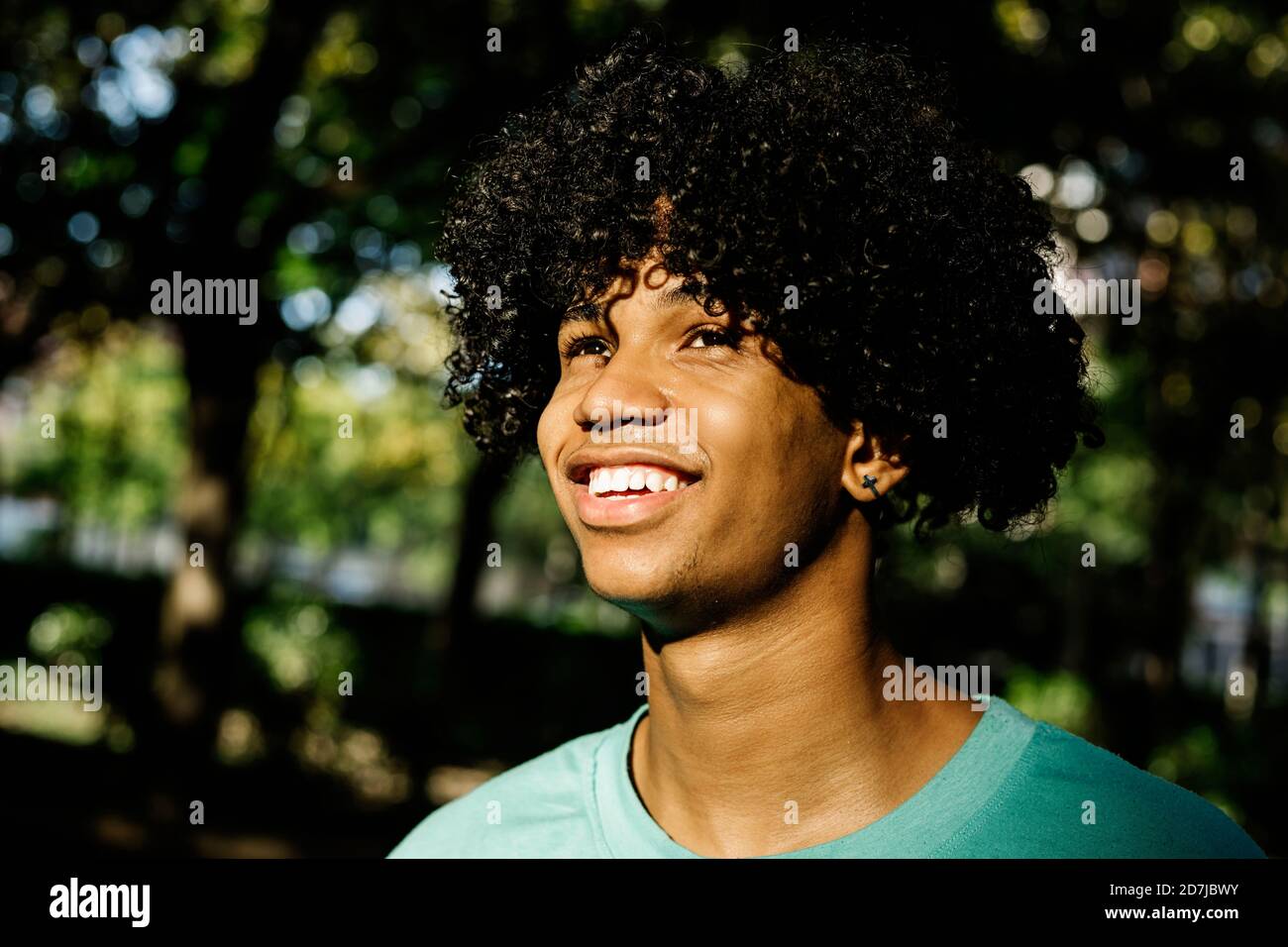 Hipster man standing in park hi-res stock photography and images - Alamy