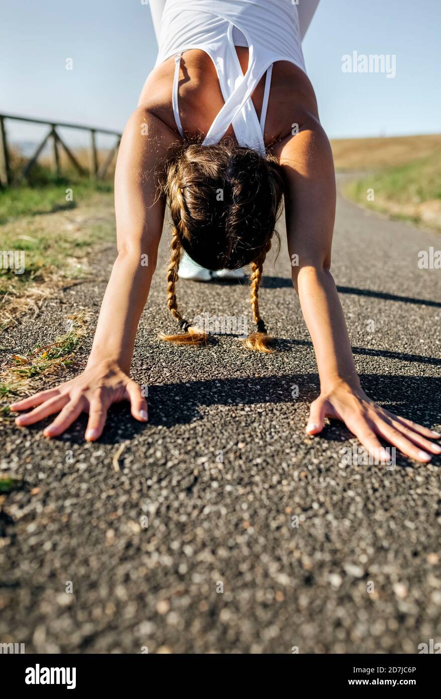 Woman bending down hi-res stock photography and images - Alamy