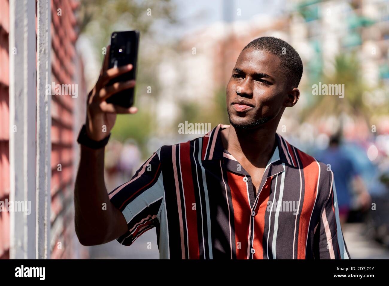 Young man taking selfie over hi-res stock photography and images - Alamy