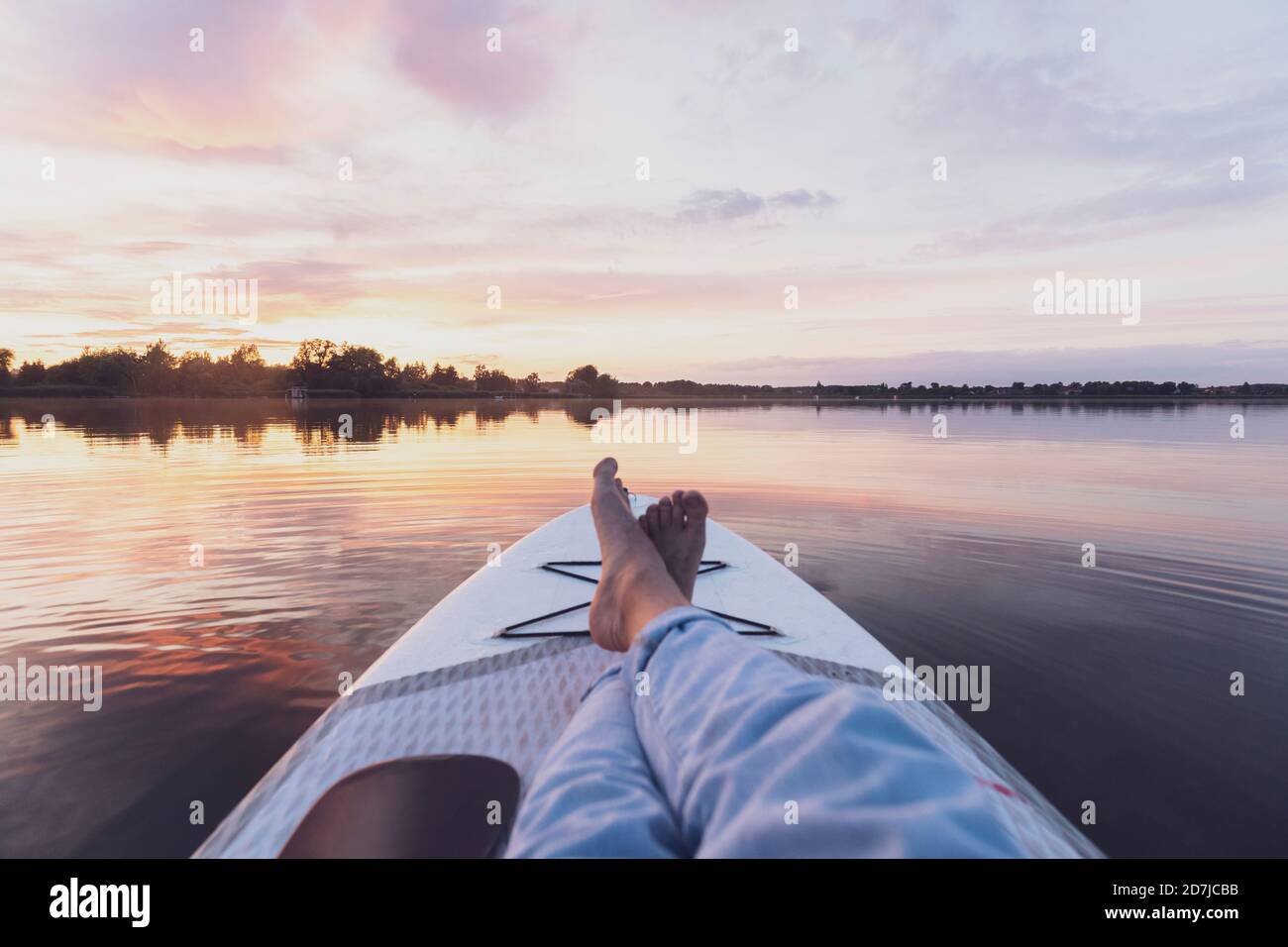 Legs of woman on surfboard hi-res stock photography and images - Alamy