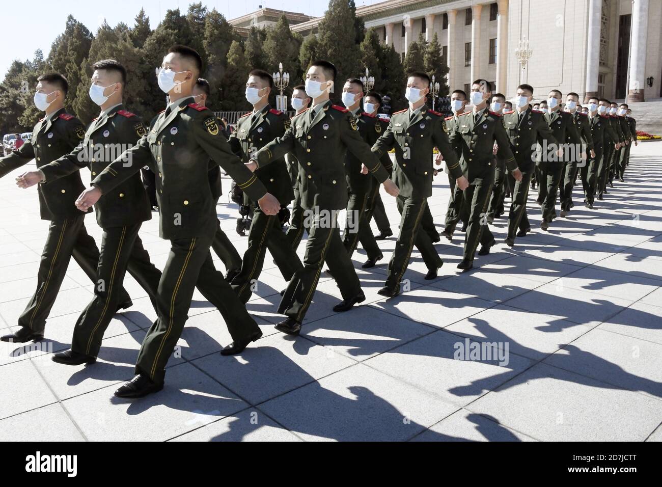 Beijing, China. 23rd Oct 2020. Armed police officers leave after a ...