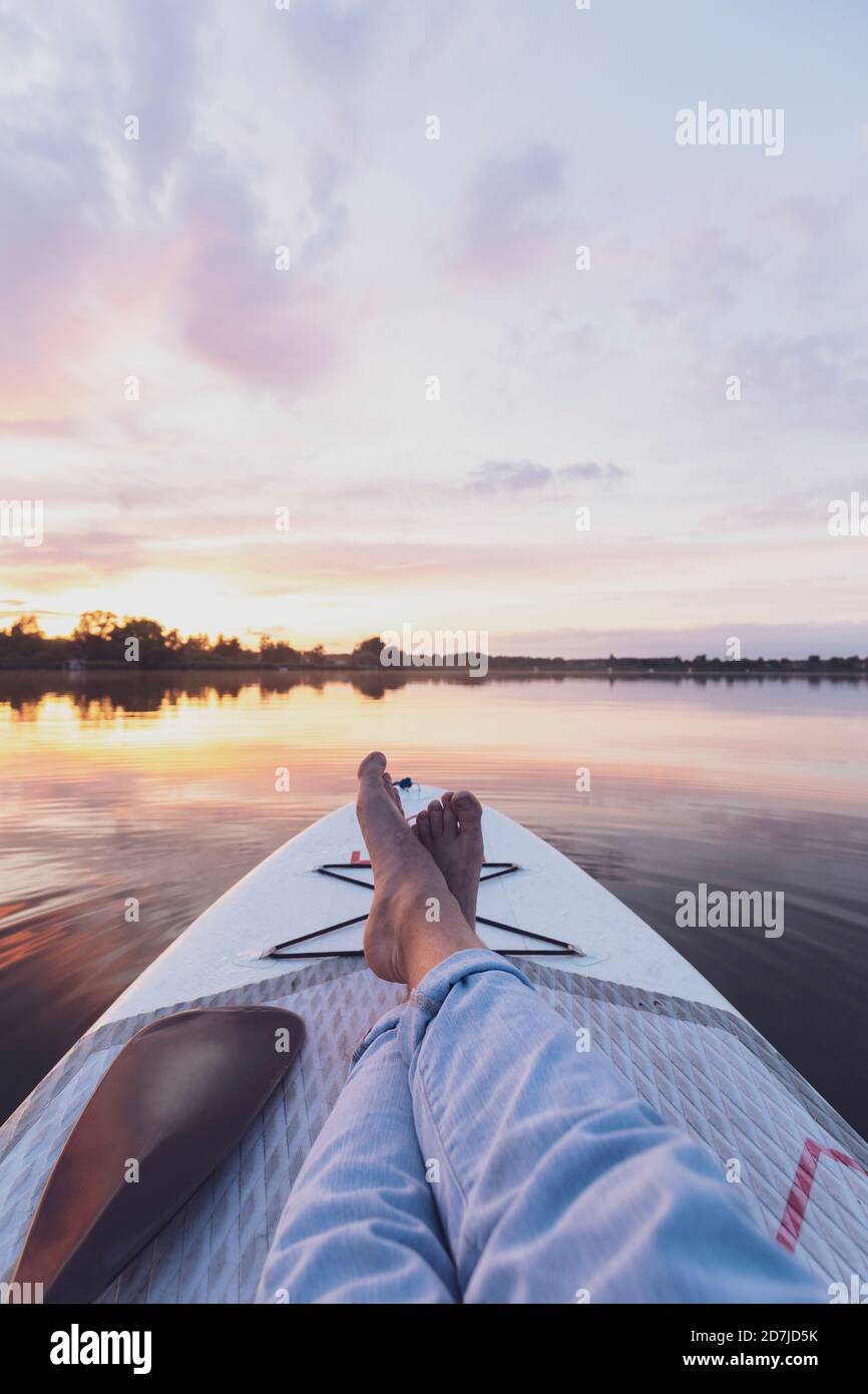 Legs of woman on surfboard hi-res stock photography and images - Alamy