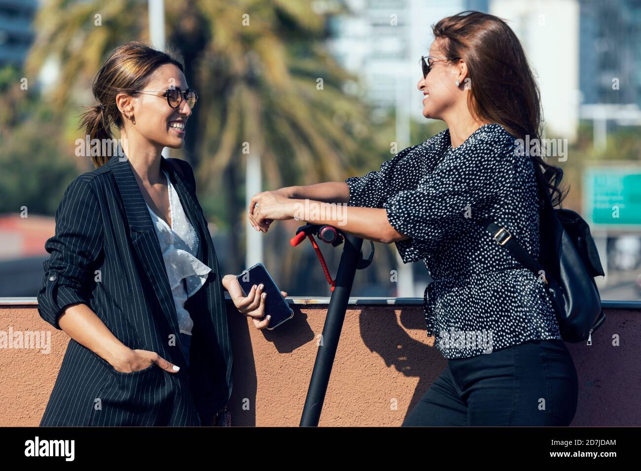 Two women standing on bridge hi-res stock photography and images - Alamy