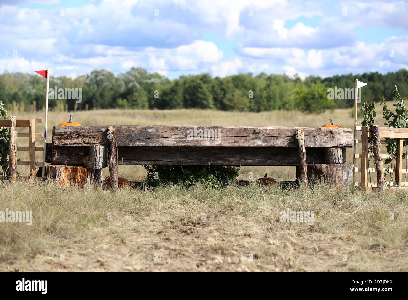 Photo of eventing equestrian rider jumping log barrier Stock Photo - Alamy