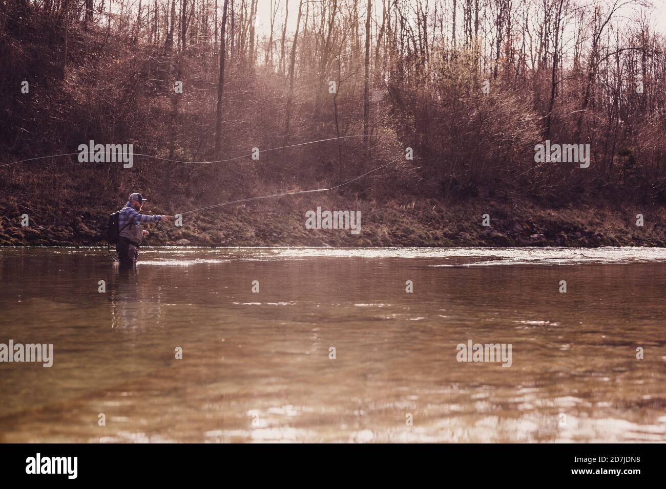 Throwing fishing rod hi-res stock photography and images - Alamy