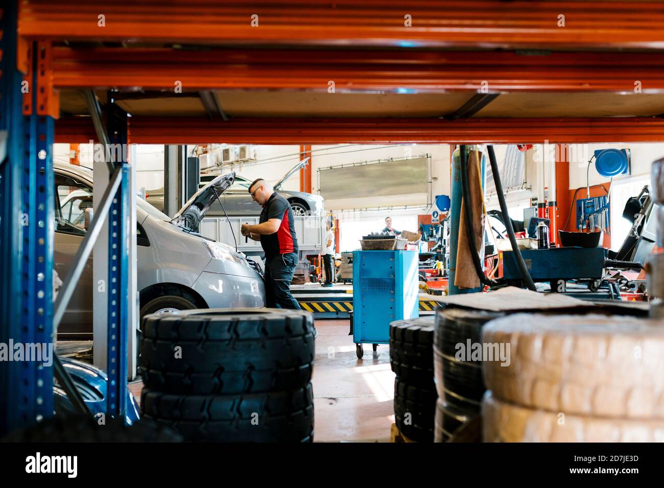 Car mechanic in car hi-res stock photography and images - Alamy