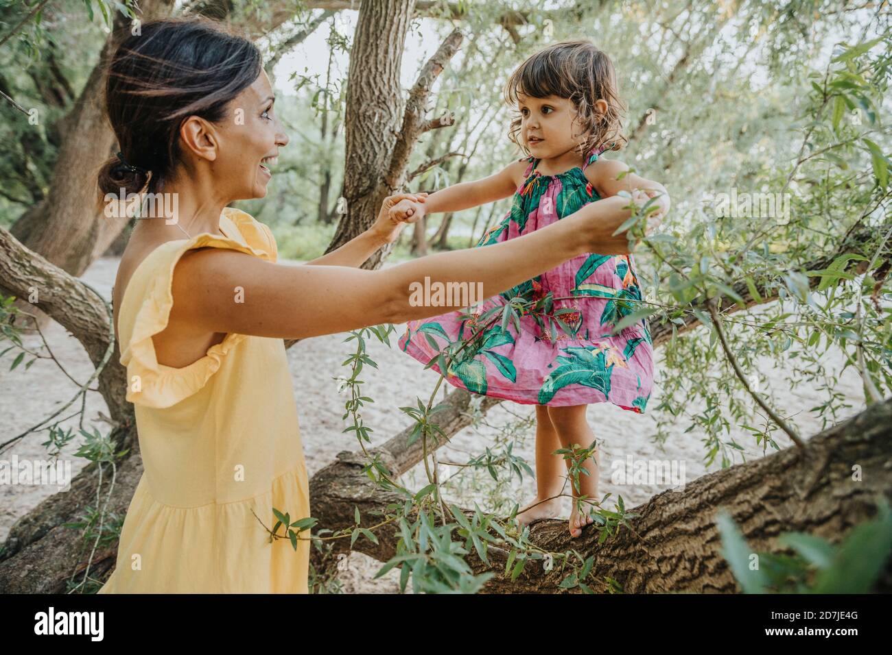 Three children stand hi-res stock photography and images - Alamy