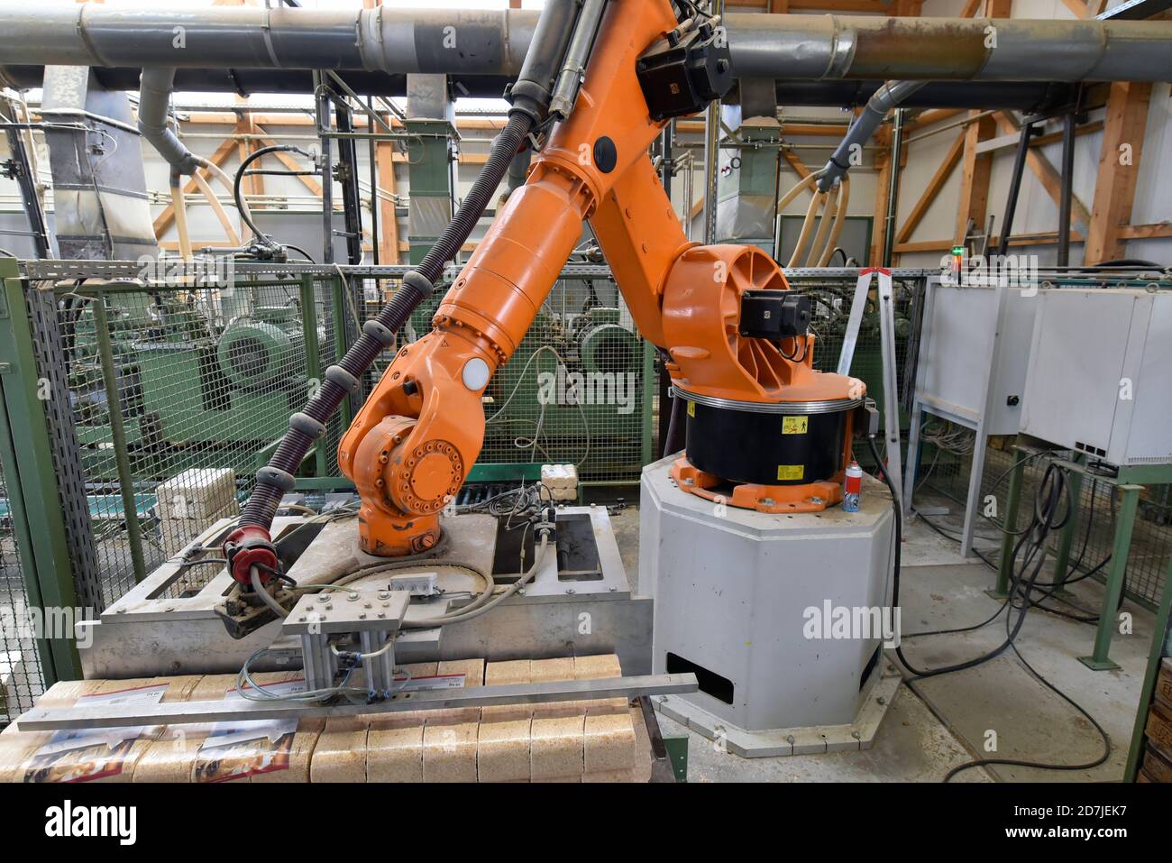 Robotic arm operating in modern lumberyard Stock Photo - Alamy