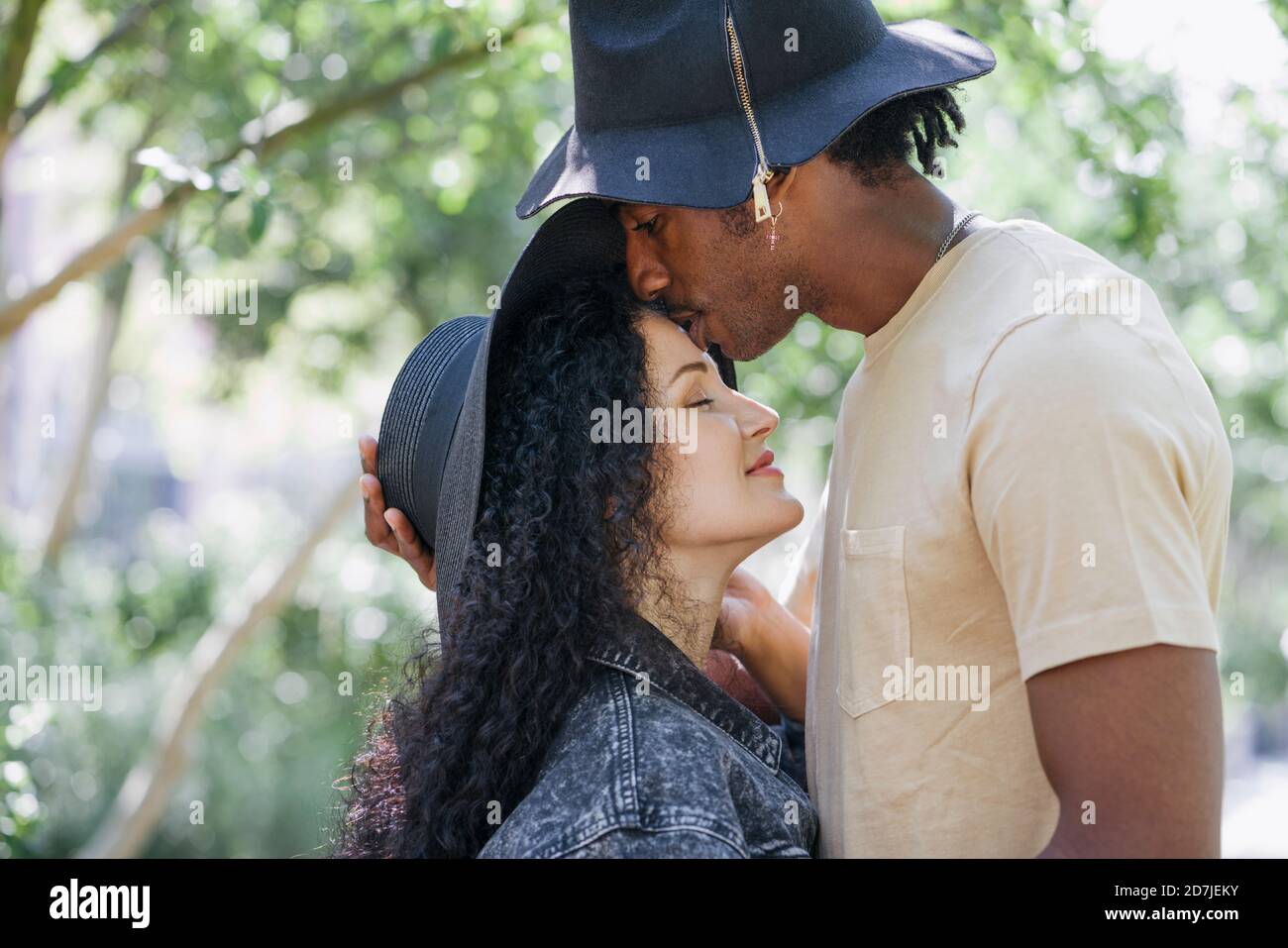 Man kissing her on the forehead hi-res stock photography and images - Alamy