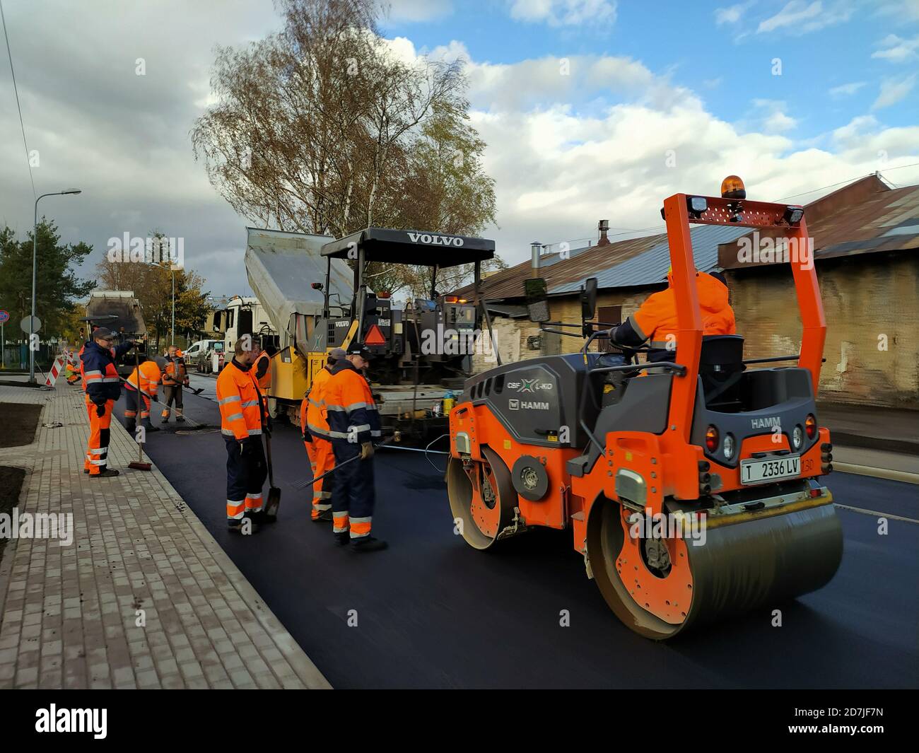 Asphalting the road Stock Photo - Alamy