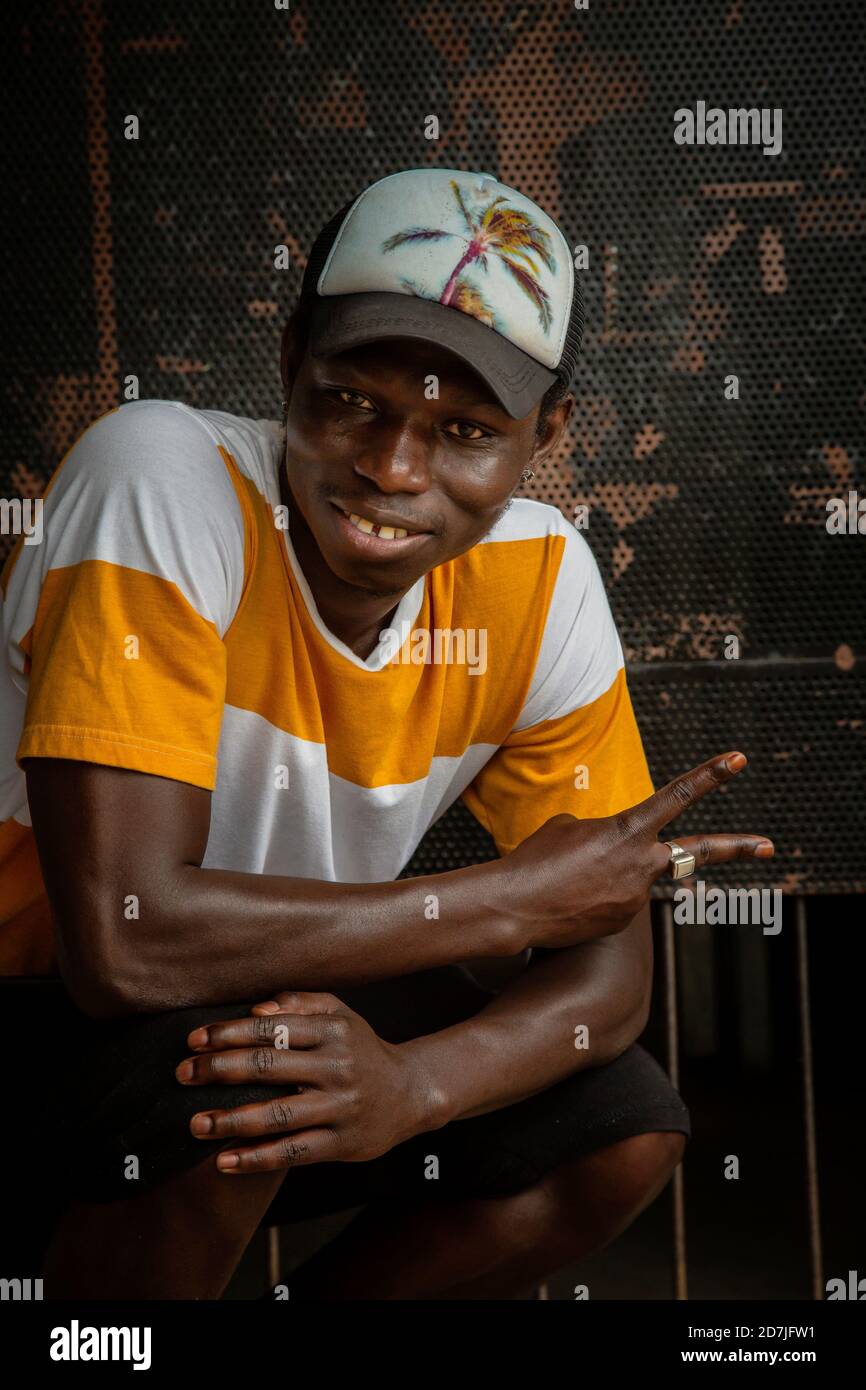 Young man wearing sign hi-res stock photography and images - Alamy