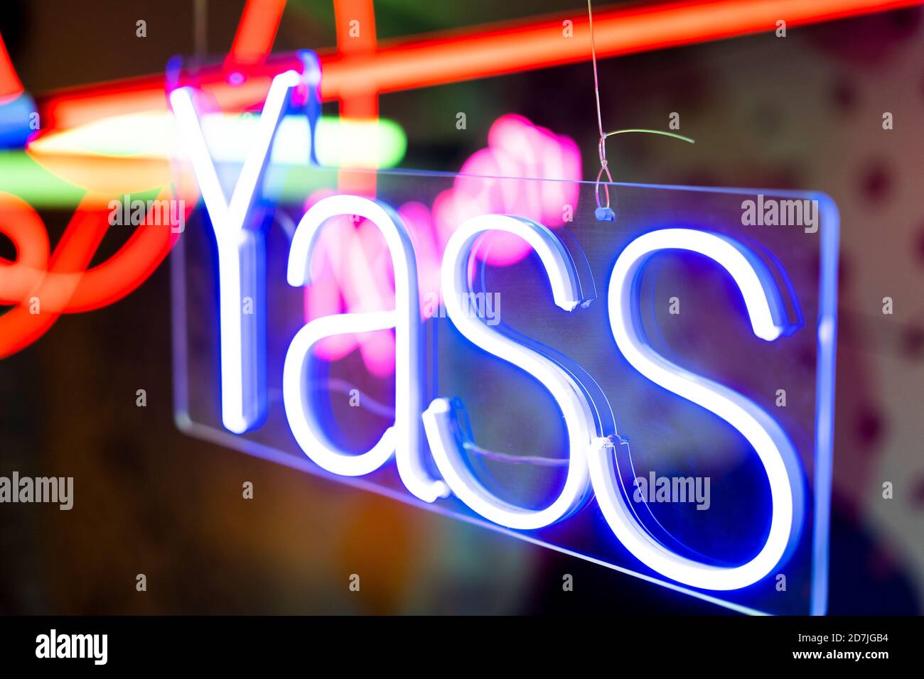 Blue neon sign glowing indoors Stock Photo - Alamy