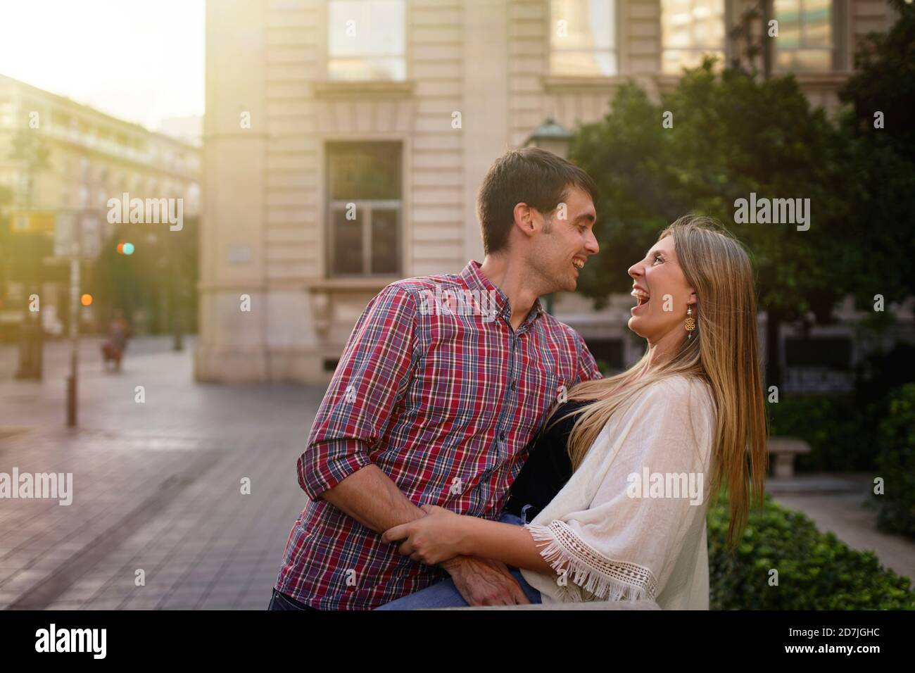 Couple standing on street hi-res stock photography and images - Alamy