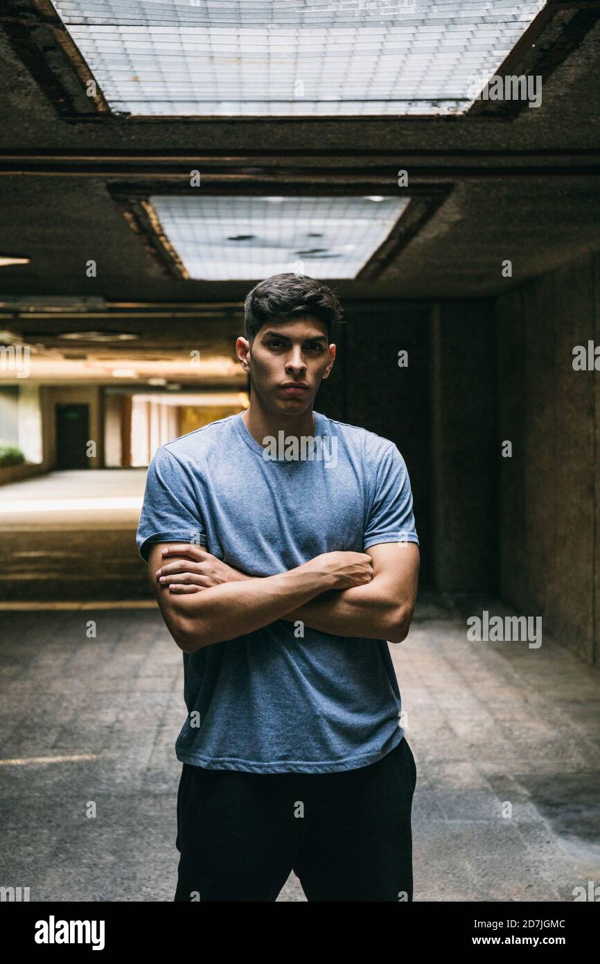 Muscular man crossed arms hi-res stock photography and images - Alamy