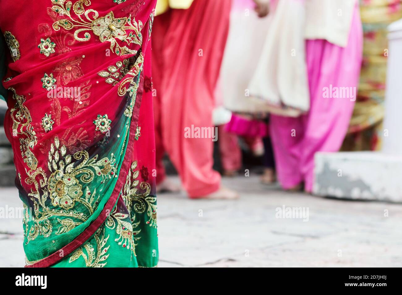 woman with colorful traditional sari dresses in nepal Stock Photo - Alamy