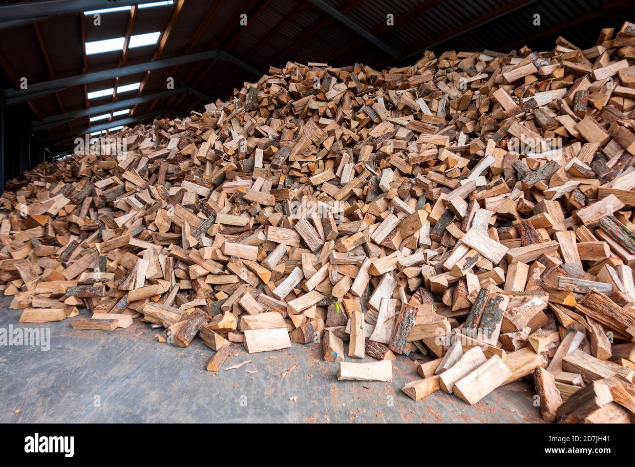 Large heap of firewood Stock Photo - Alamy