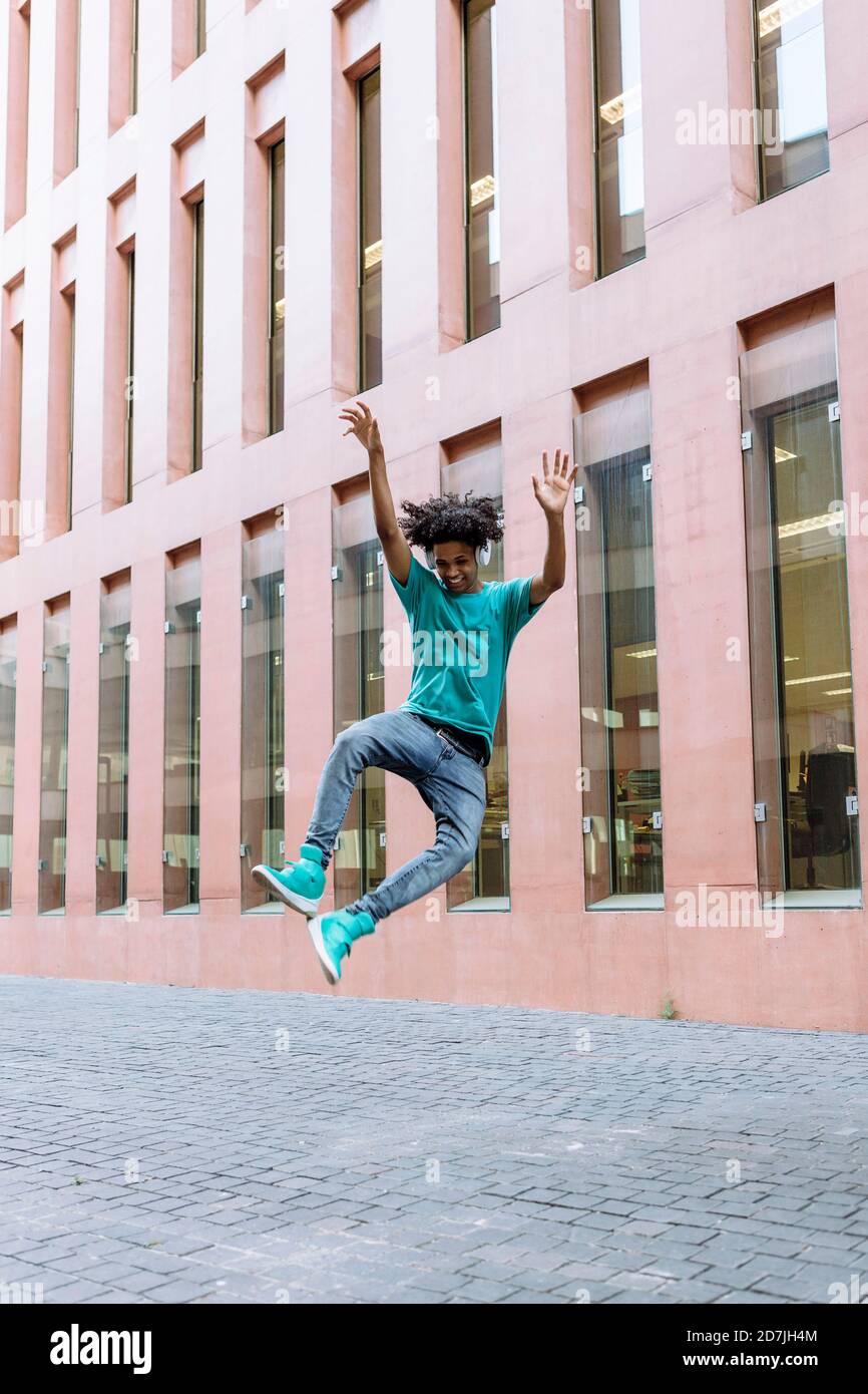 Hispanic man hand raised hi-res stock photography and images - Alamy