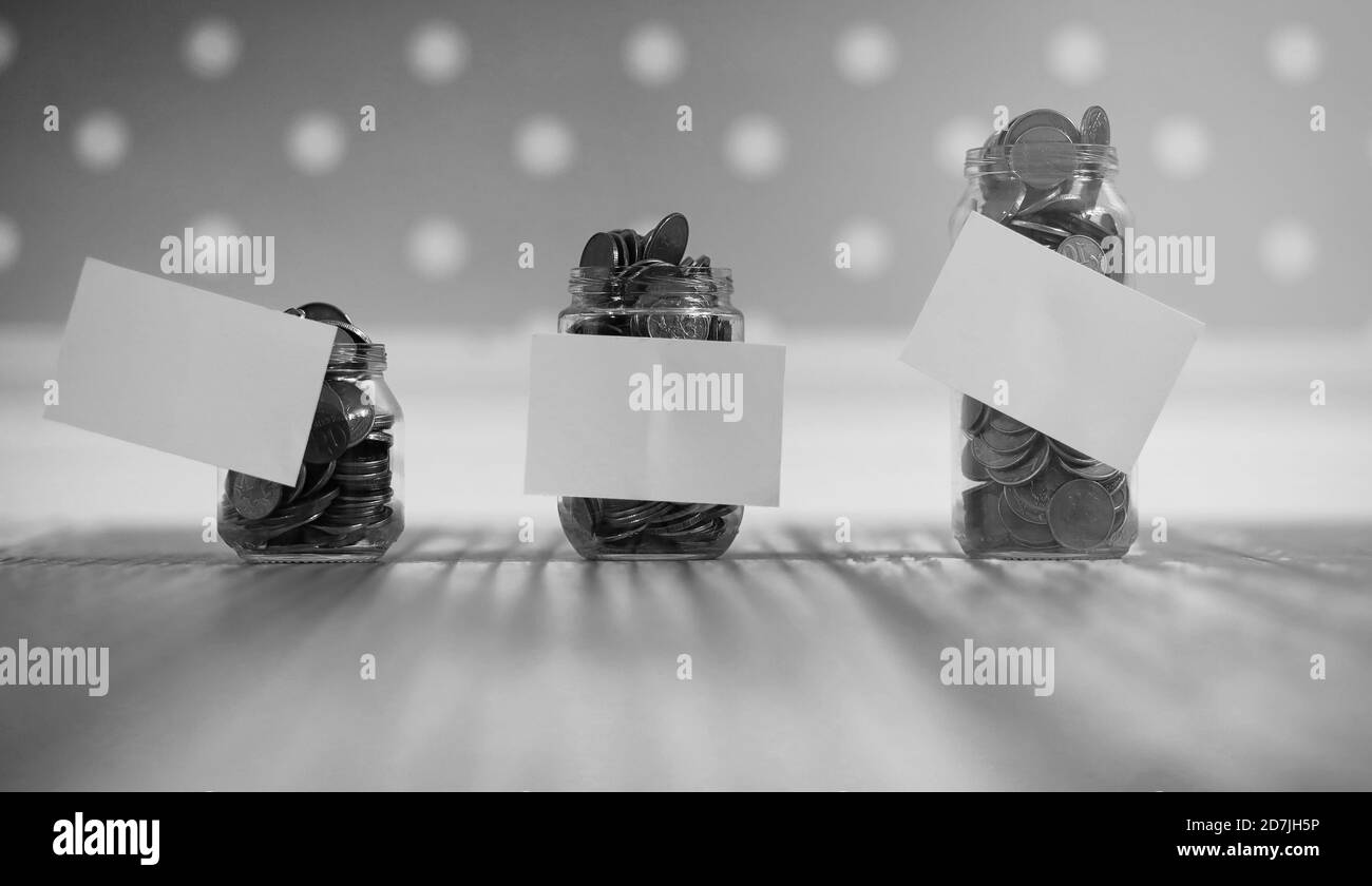 Open jar money savings Black and White Stock Photos & Images - Alamy