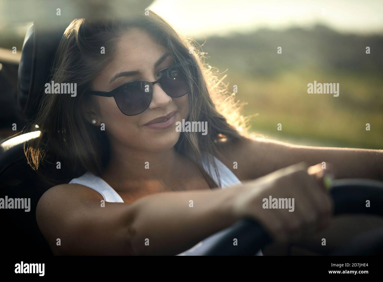 Woman driving convertible hi-res stock photography and images - Alamy