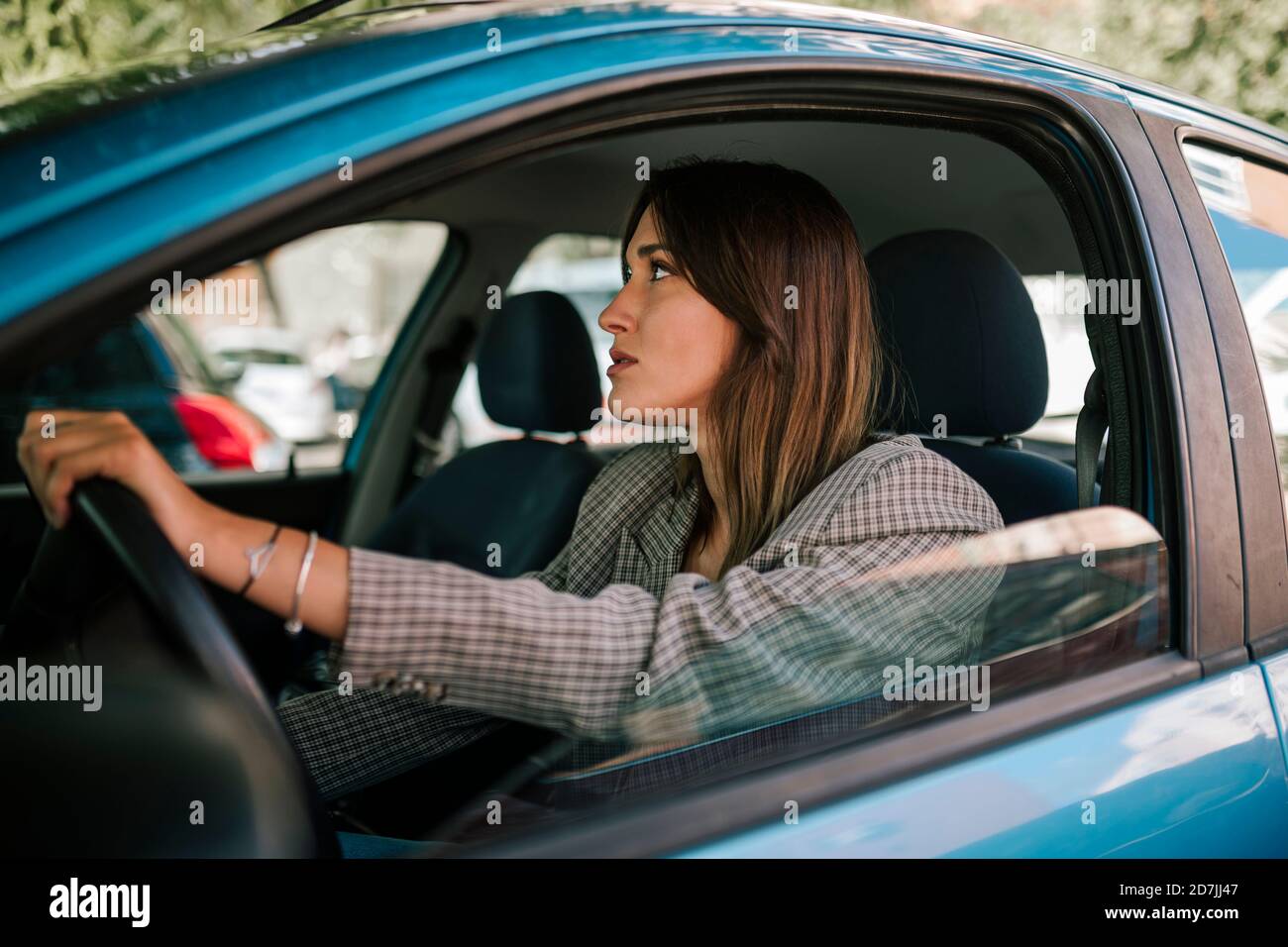 Woman driving car hi-res stock photography and images - Alamy