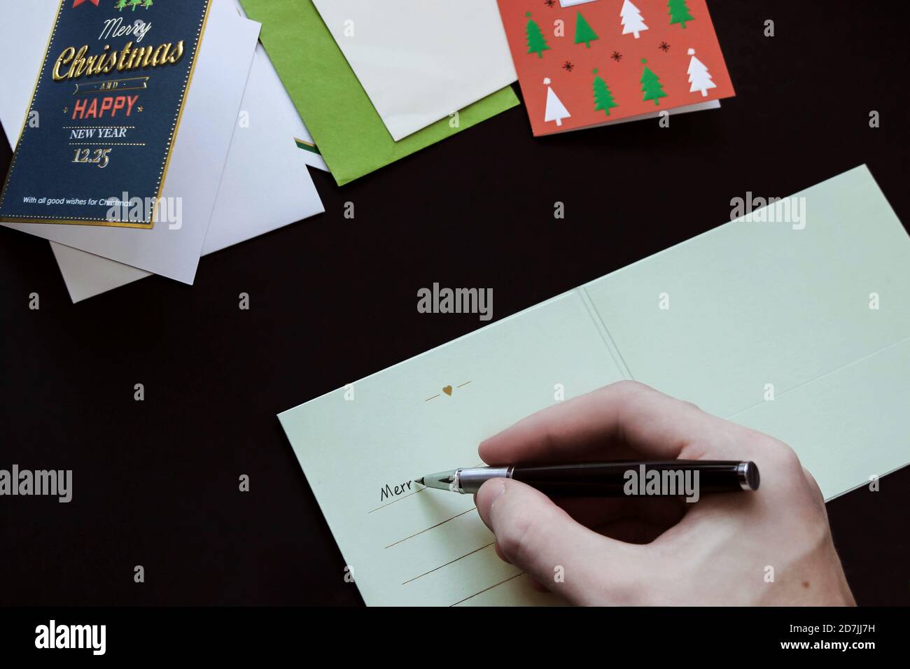 Man hand writing christmas hi-res stock photography and images - Alamy