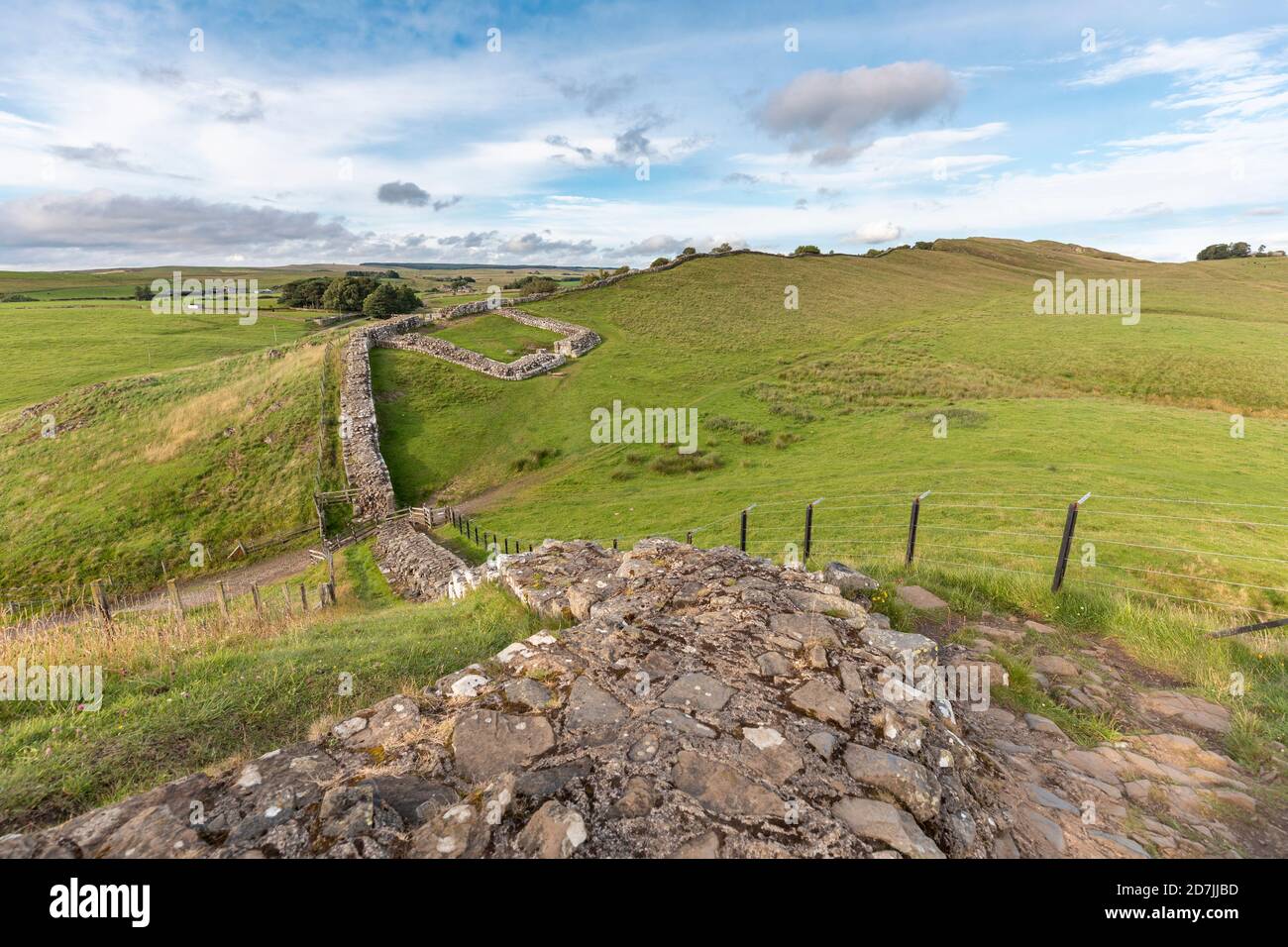 UK, England, Hexham, Hadrians Wall surrounded by green countryside ...