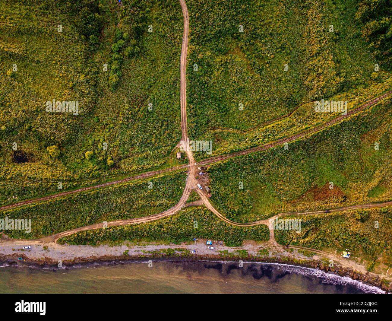 Russia, Primorsky Krai, Zarubino, Aerial view of coastal dirt road and ...