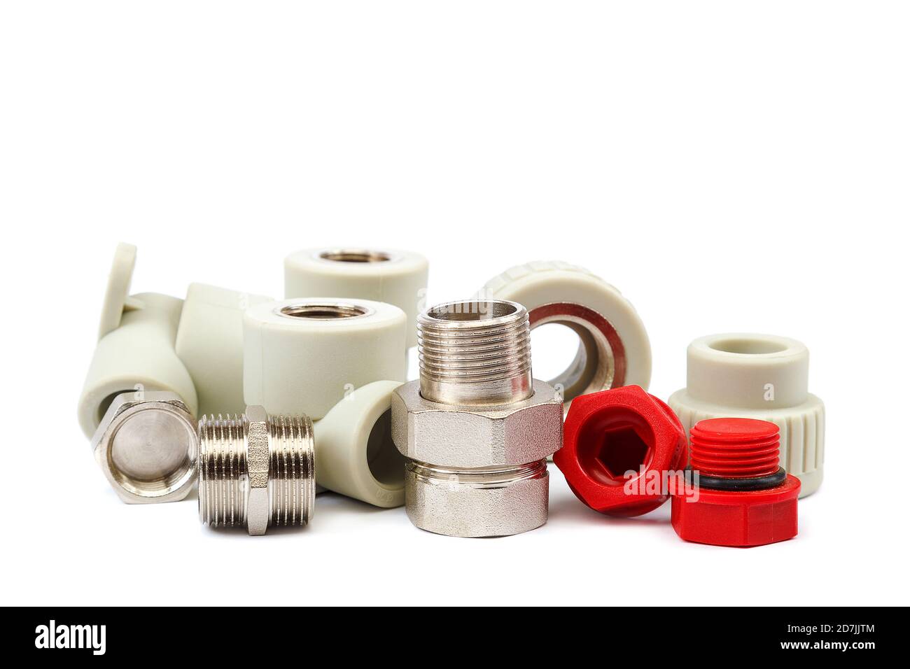 Set of metal-plastic plumbing couplings, adapters, plugs isolated on ...