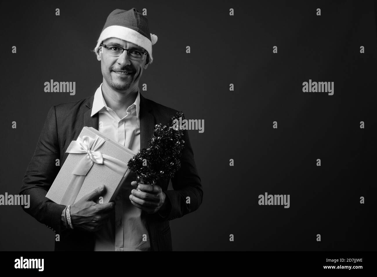 Businessman in gift box Black and White Stock Photos & Images - Alamy