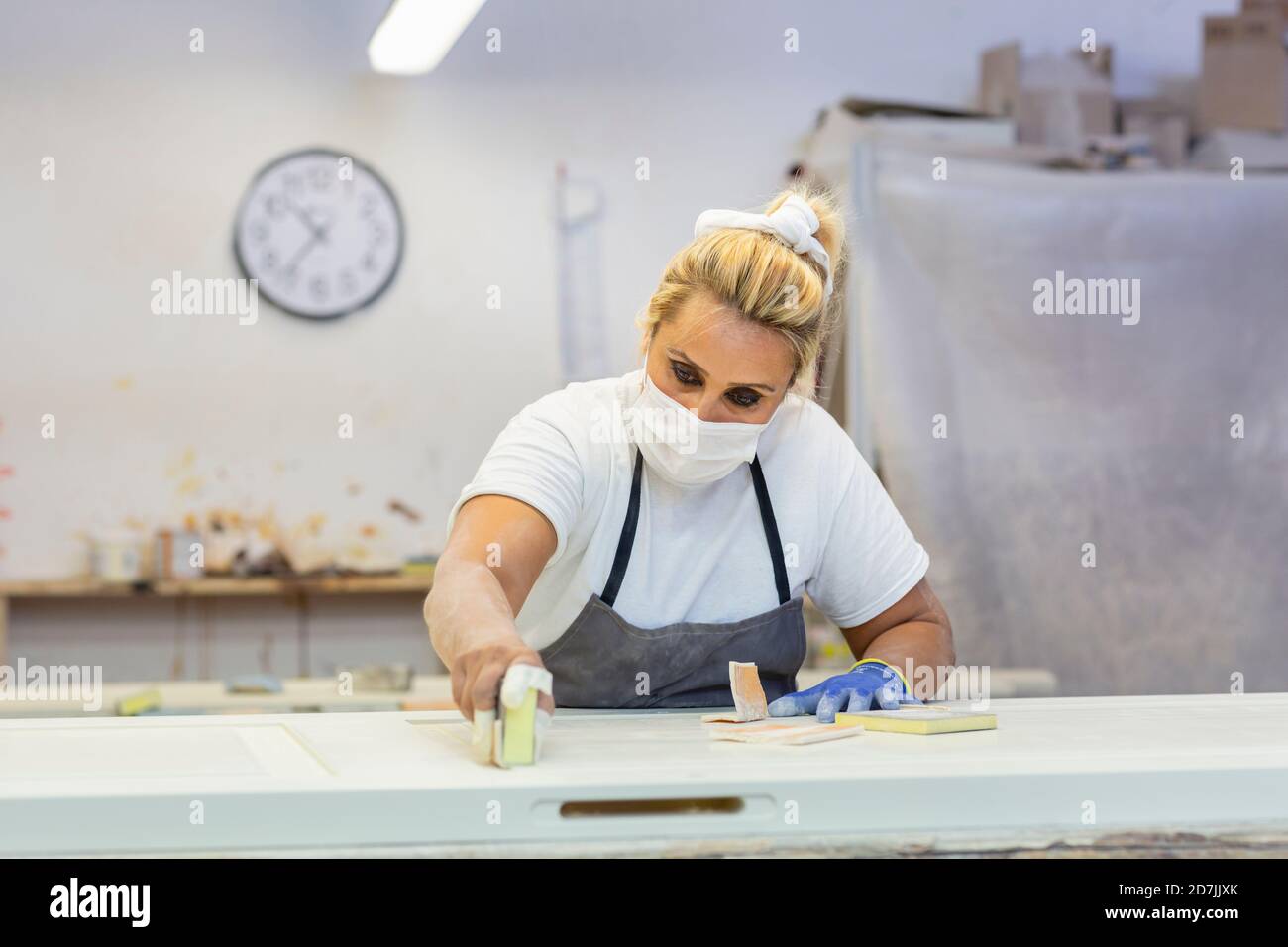 Woman sanding hi-res stock photography and images - Alamy