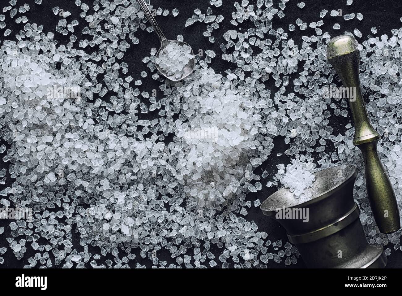 Large sea salt. Spice. Mortar and pestle for grinding Stock Photo - Alamy