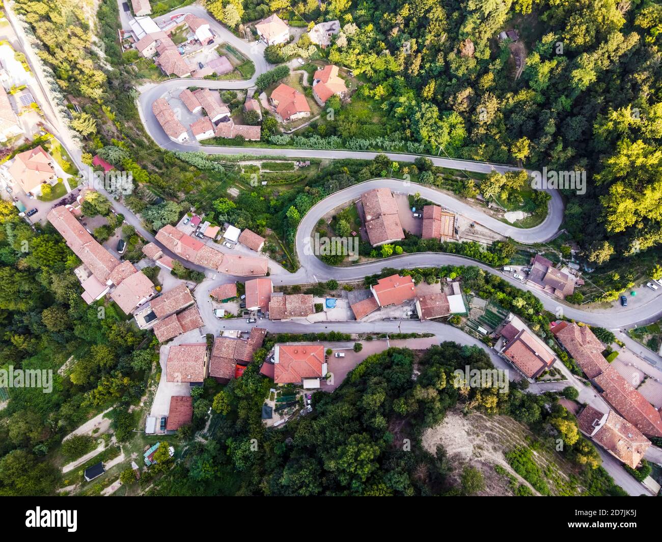 Drone view of roads winding through rural town Stock Photo - Alamy