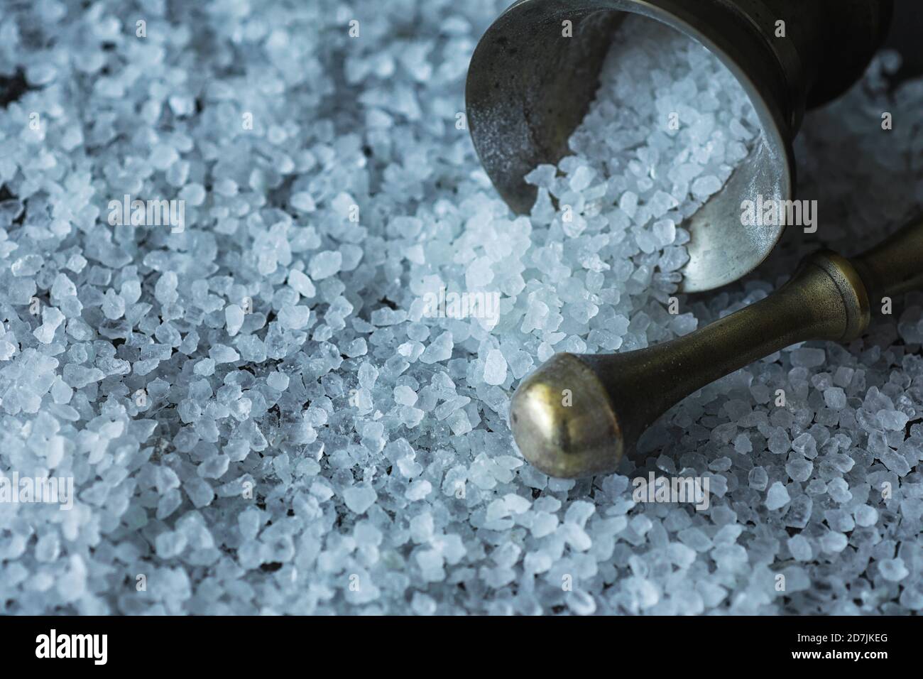 Large sea salt. Spice. Mortar and pestle for grinding Stock Photo - Alamy