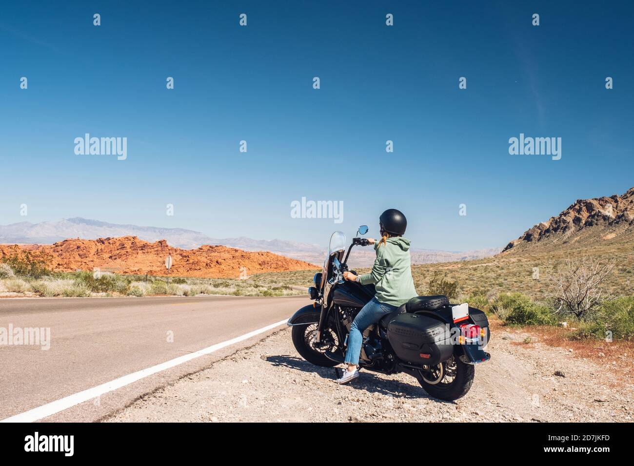 Woman riding motorcycle during summer road trip, Nevada, USA Stock ...