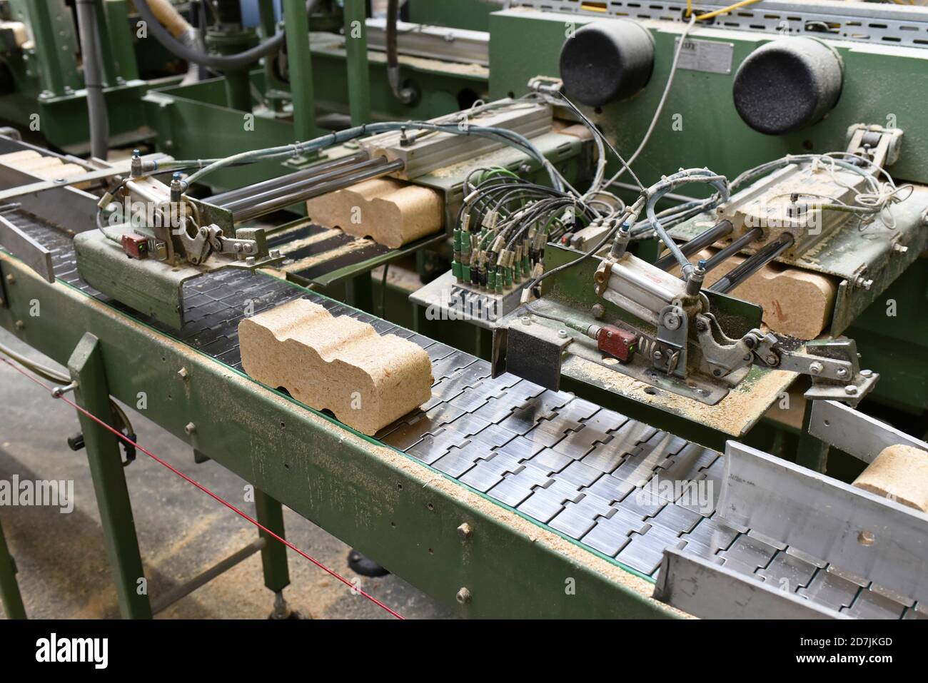 Wood being processed in lumberyard Stock Photo - Alamy