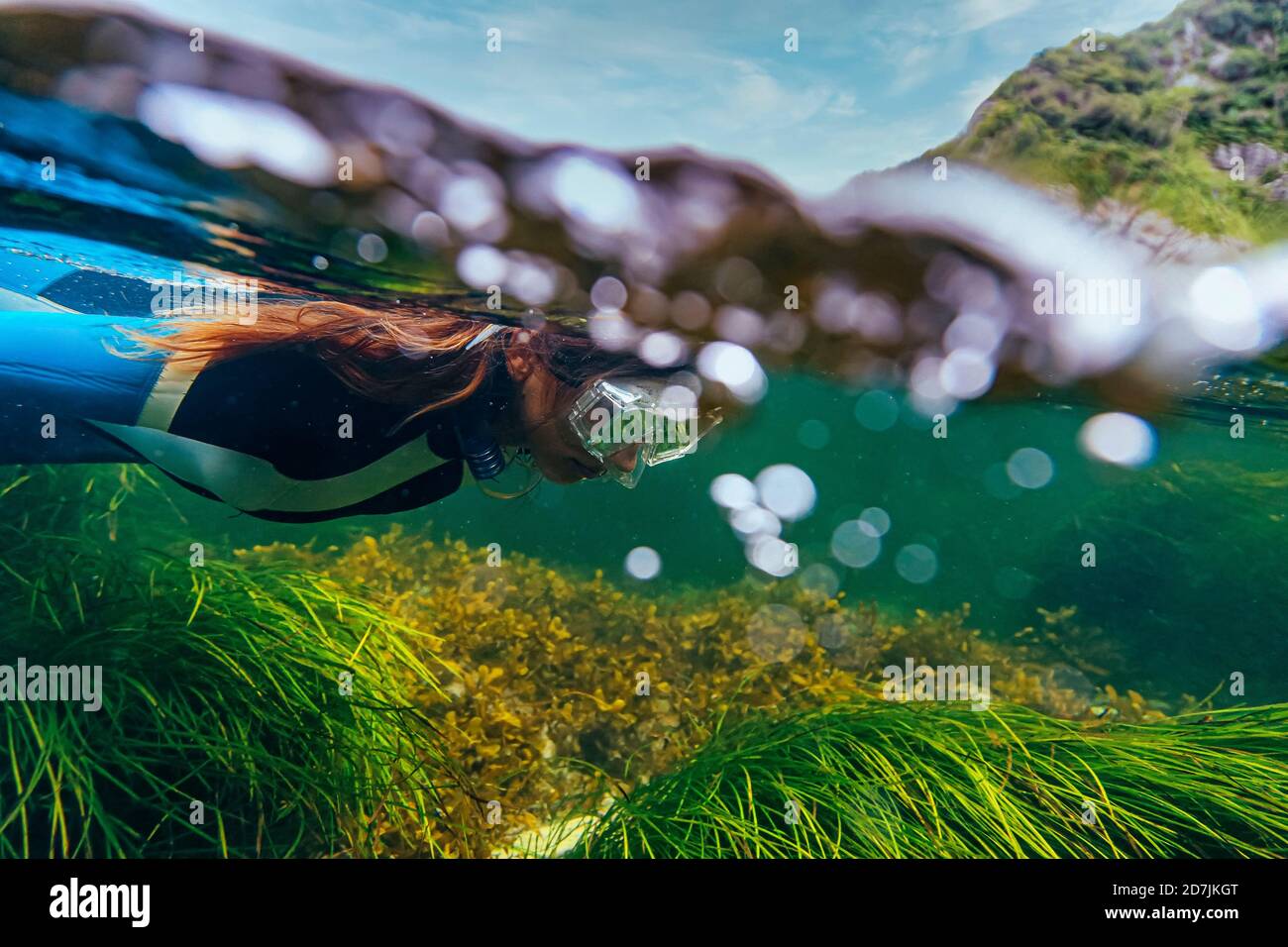 Woman diving into water hi-res stock photography and images - Alamy