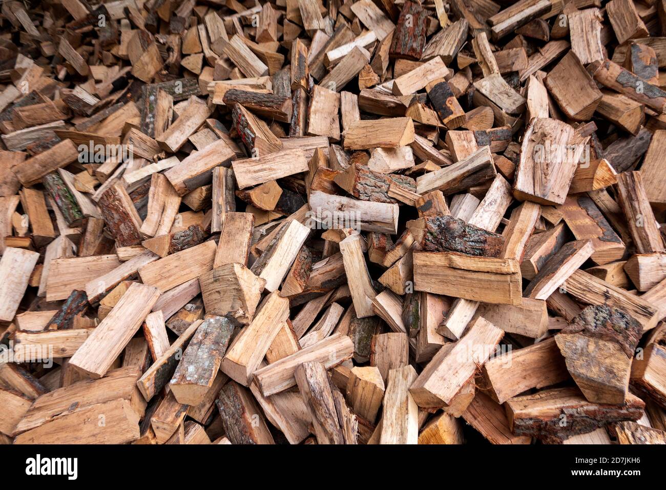 Large heap of firewood Stock Photo - Alamy