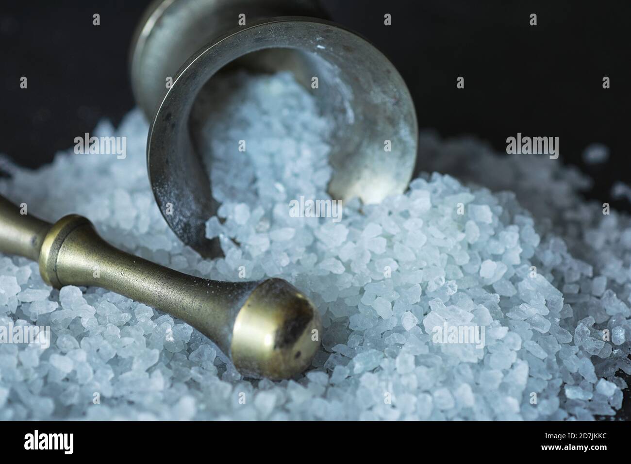 Large sea salt. Spice. Mortar and pestle for grinding Stock Photo - Alamy