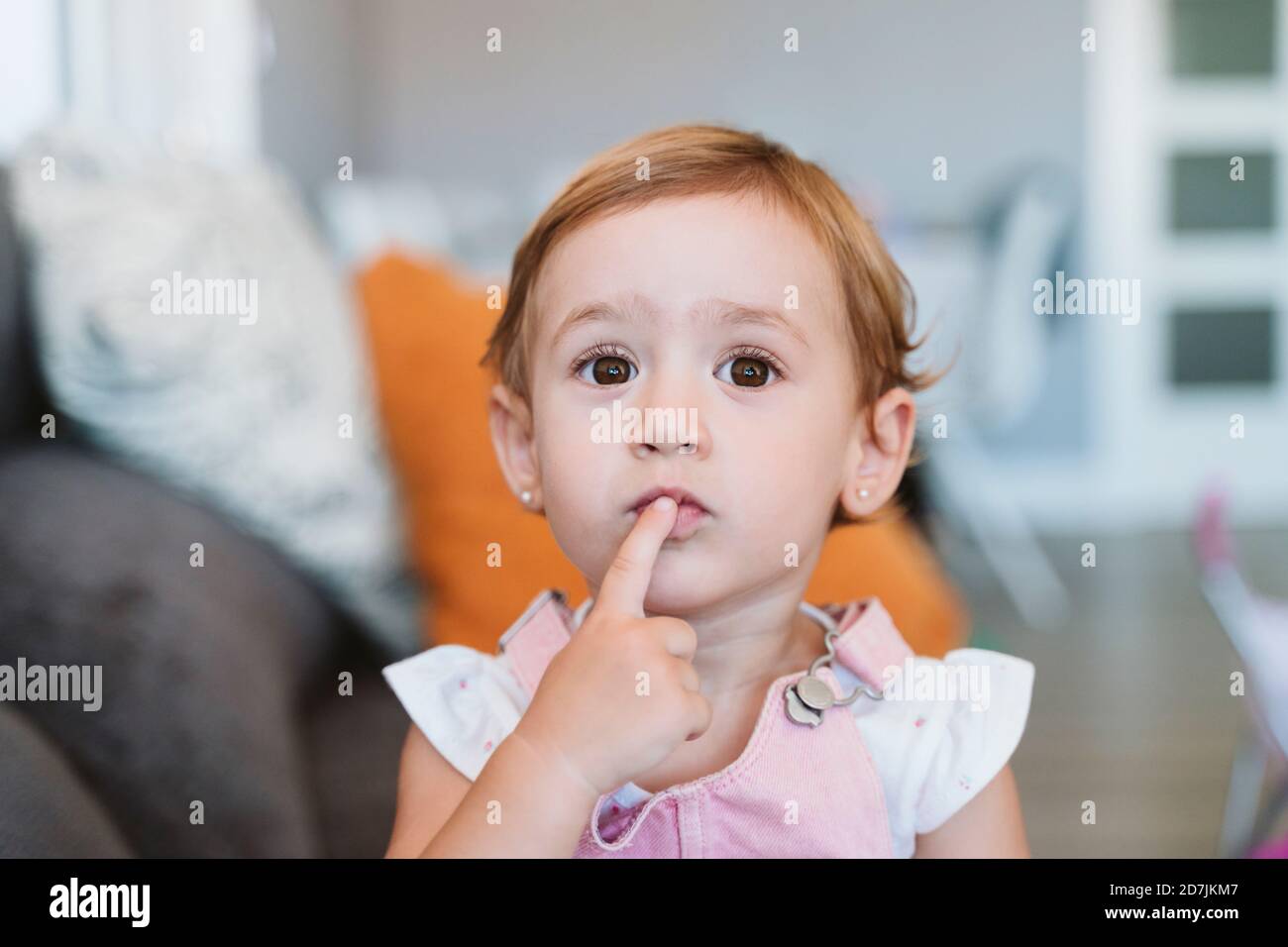 Finger at lips hi-res stock photography and images - Alamy