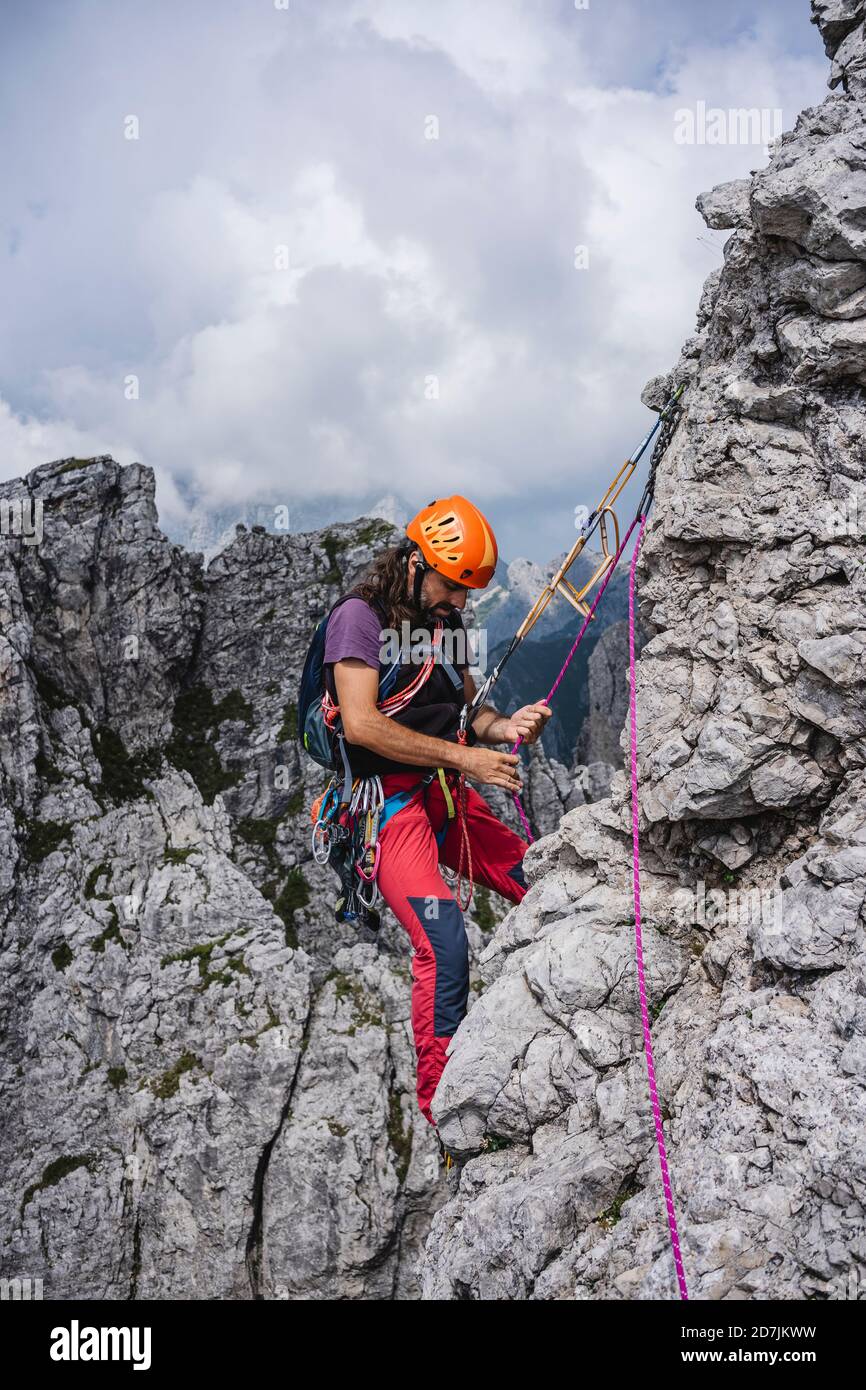 Male mountaineer rope balancing hi-res stock photography and images - Alamy