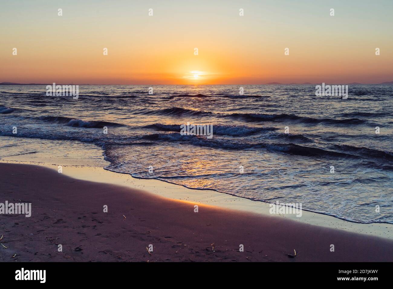 Sunset view of beach Stock Photo - Alamy