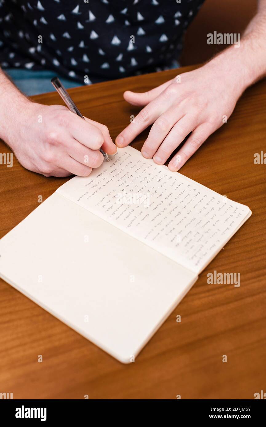 Notebook in hands hi-res stock photography and images - Alamy