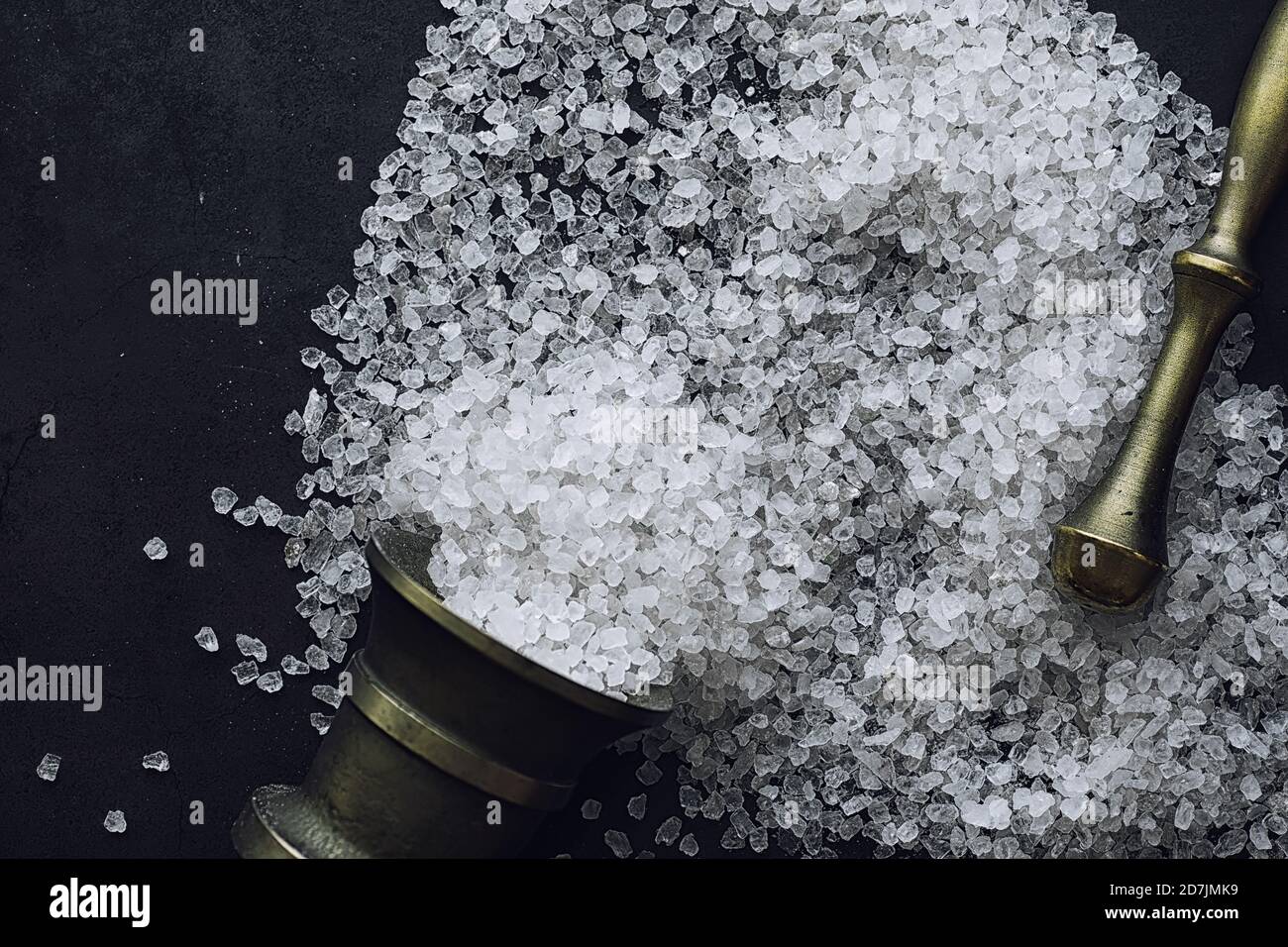 Large sea salt. Spice. Mortar and pestle for grinding Stock Photo - Alamy