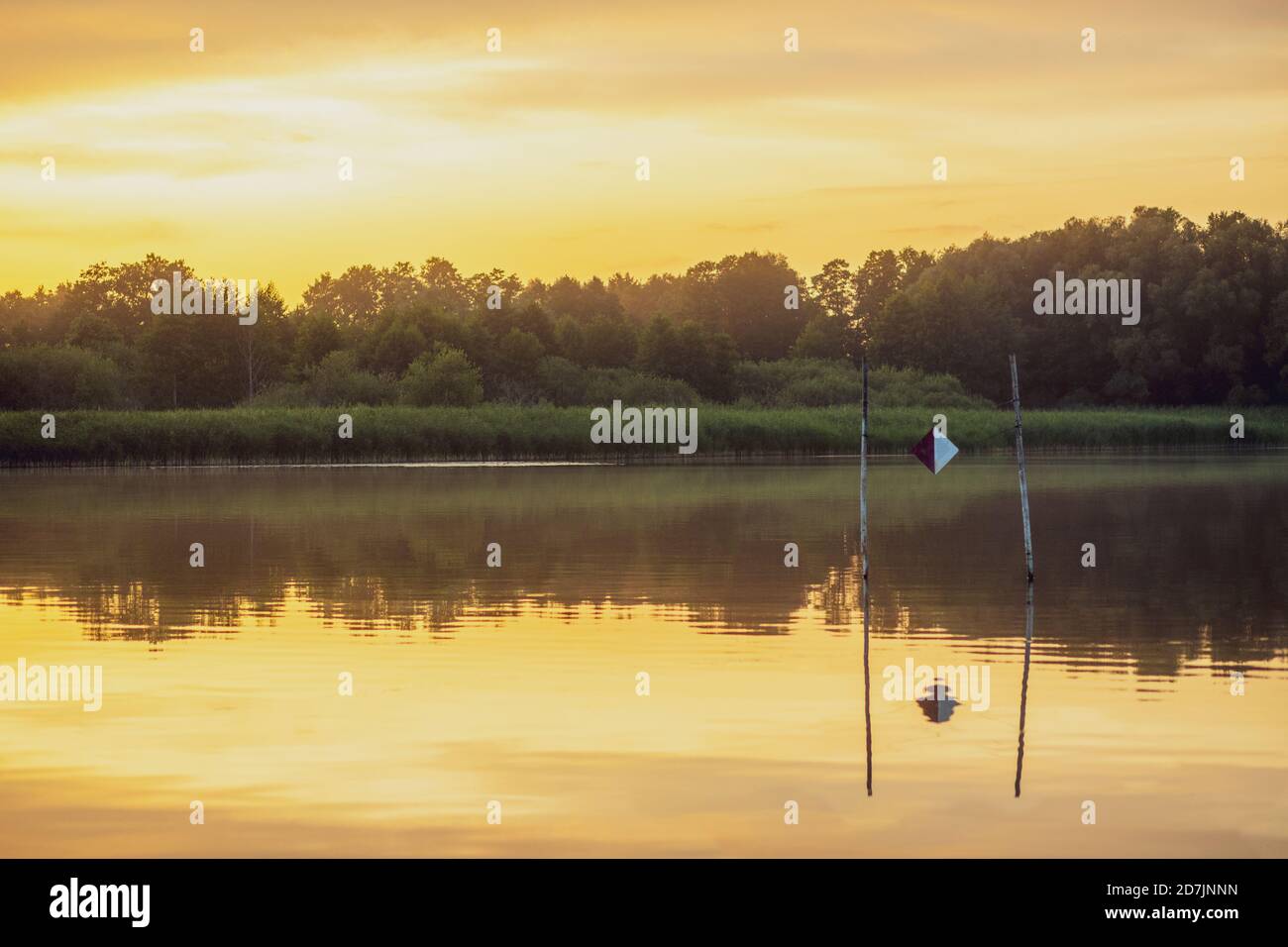 Reflection of dramatic sky in water during sunset Stock Photo - Alamy