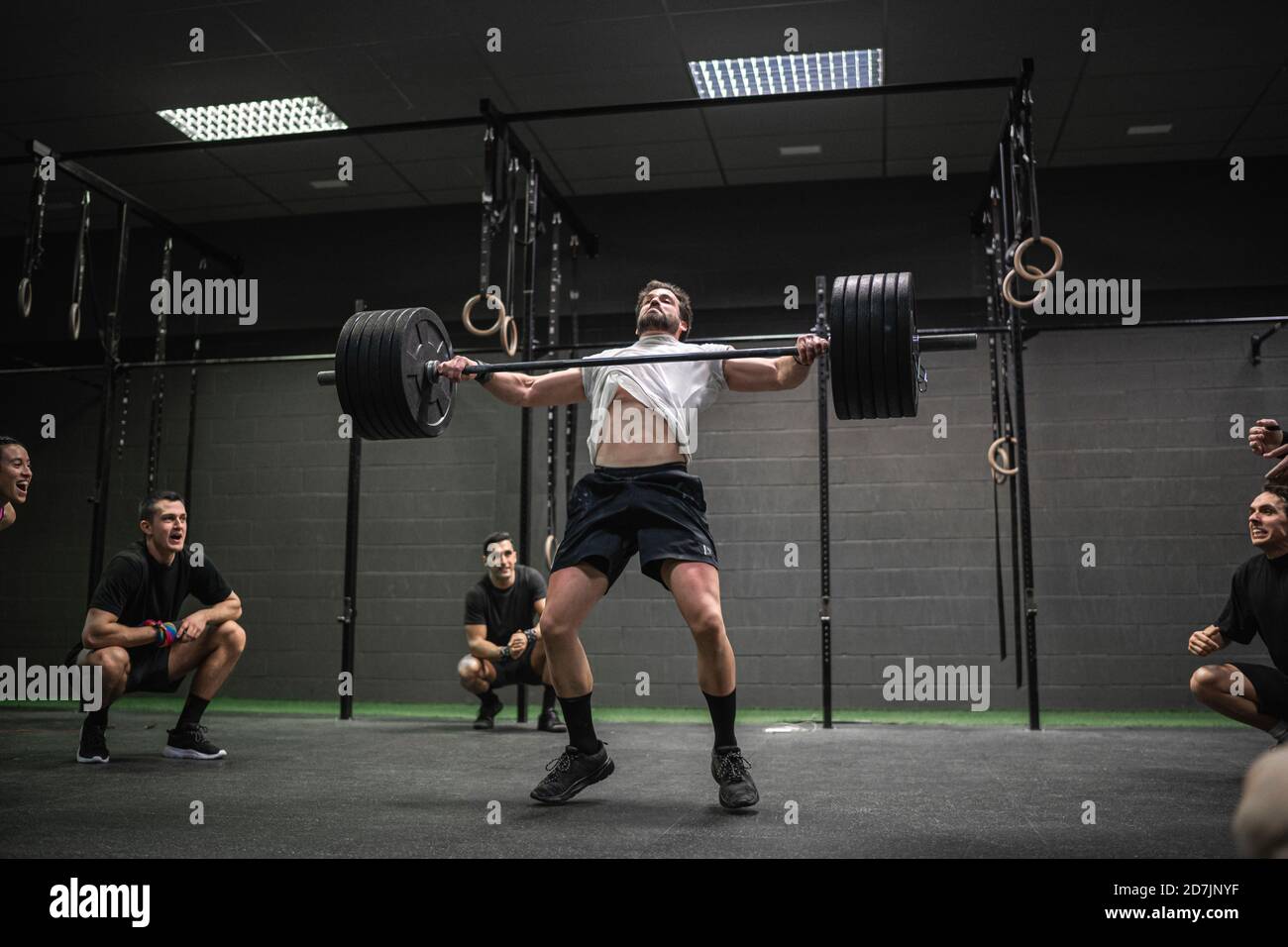 Hands lifting barbell hi-res stock photography and images - Alamy