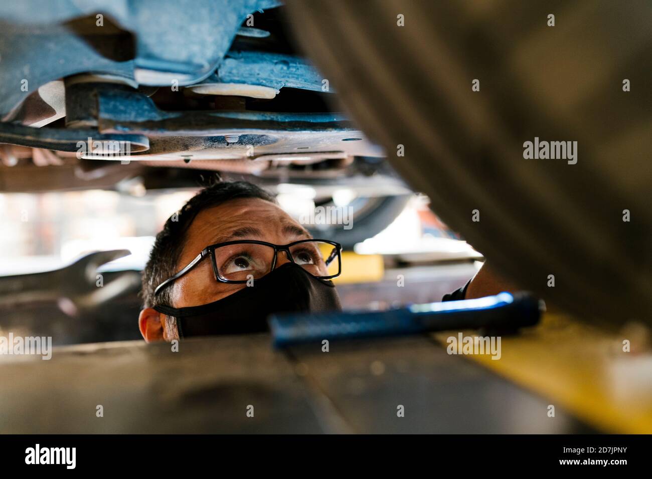 Car mechanic wearing protective hi-res stock photography and images - Alamy