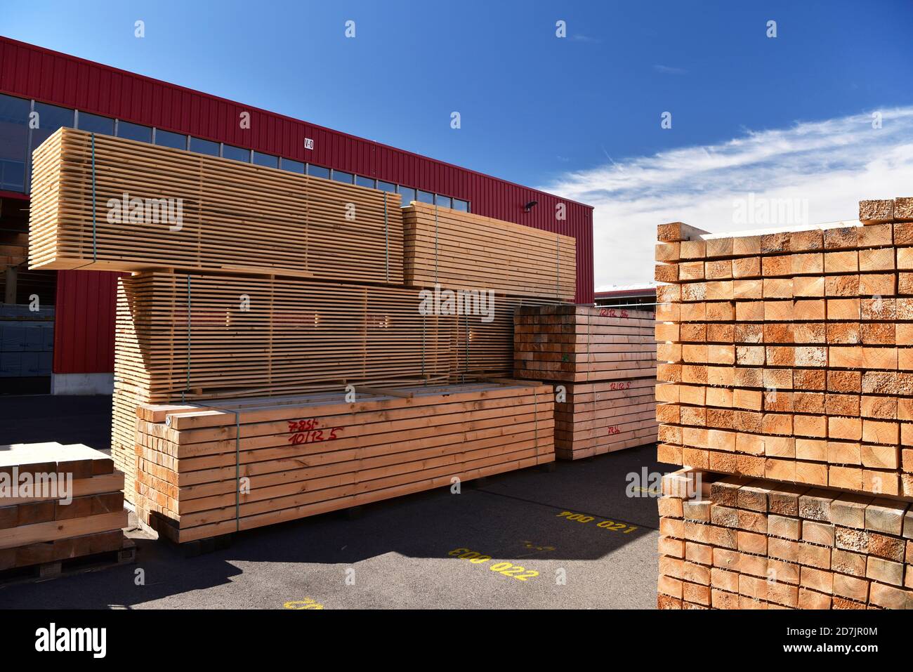 Planks stacked in lumberyard Stock Photo - Alamy