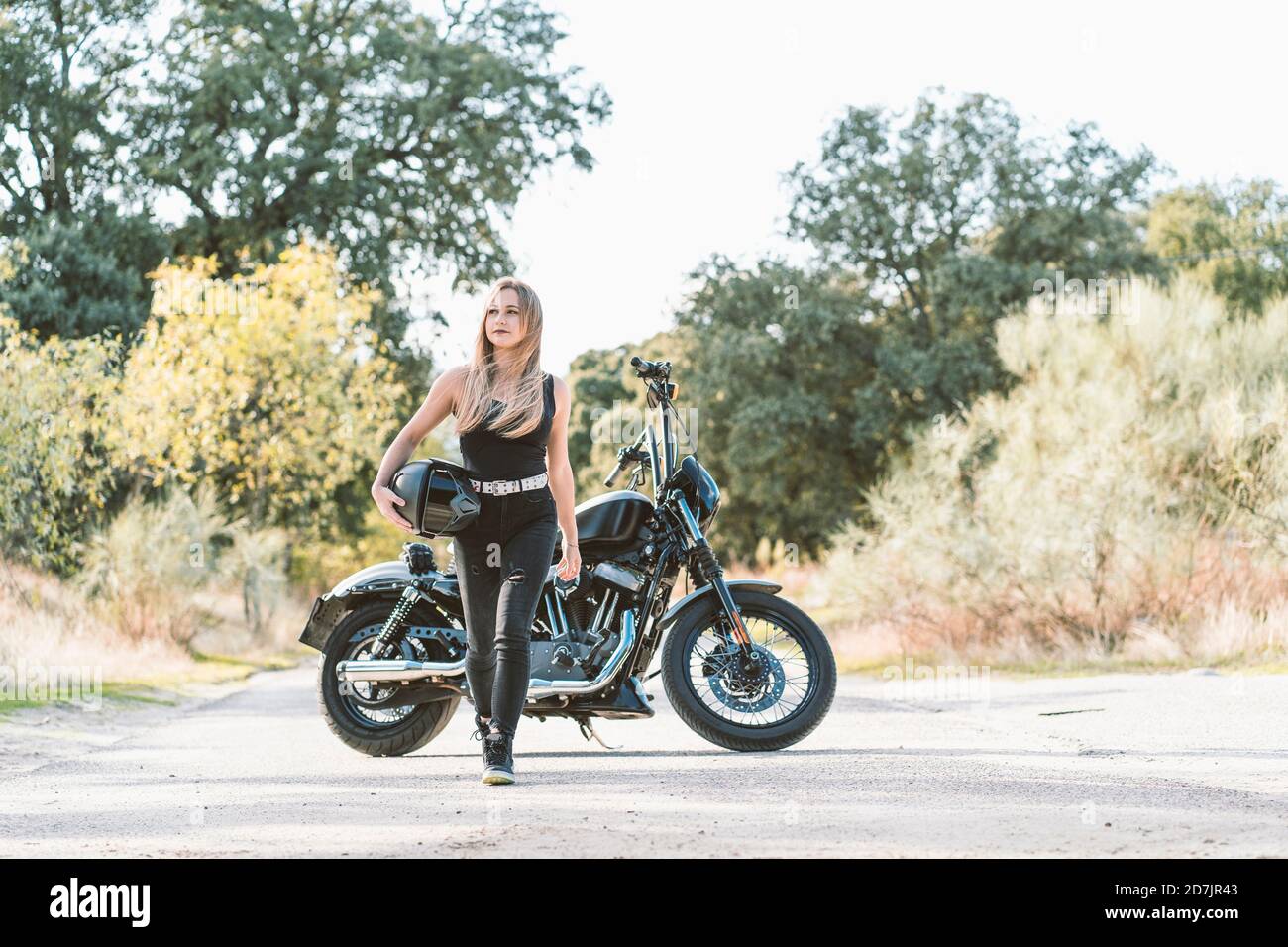 Walking with motorcycle helmet hi-res stock photography and images - Alamy